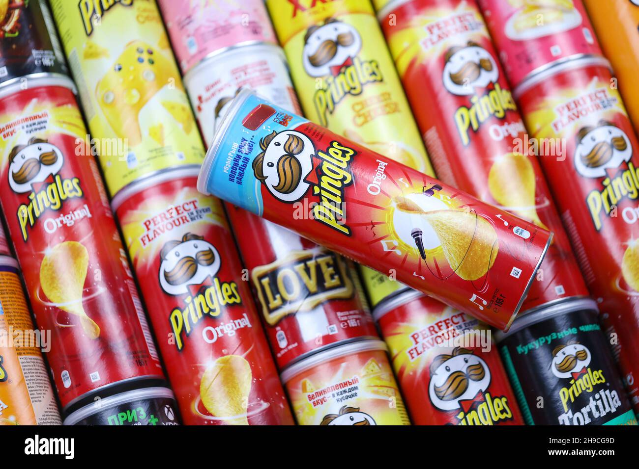 KHARKOV, UKRAINE - MARCH 30, 2021: Many Pringles cylinder chips boxes ...