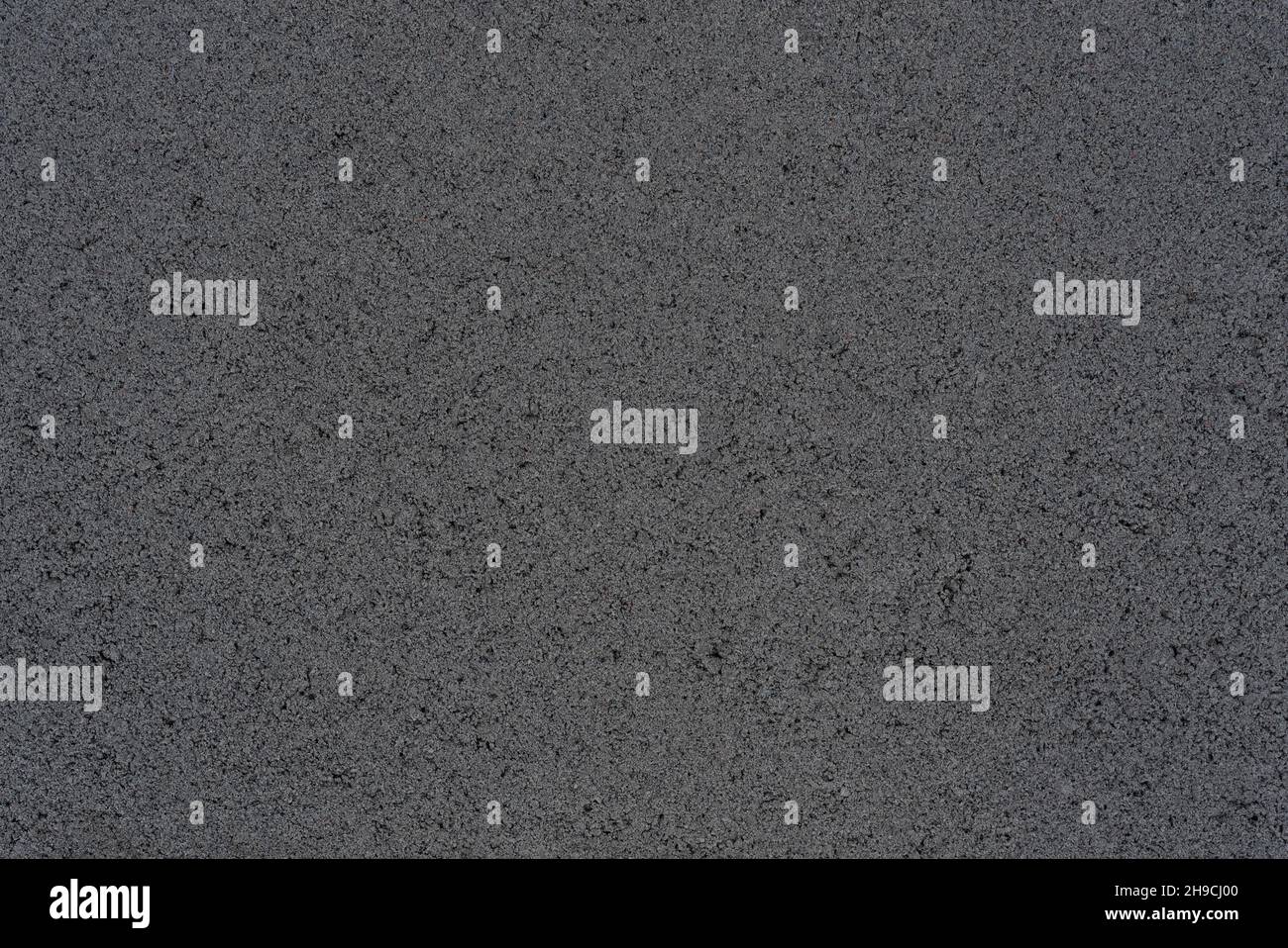 Abstract gray grainy textured background Stock Photo - Alamy