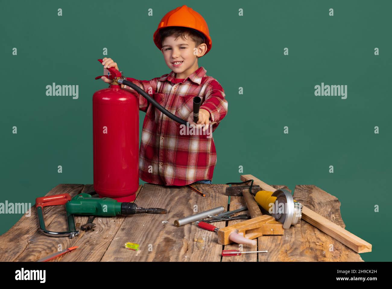 Boy work tools hi-res stock photography and images - Alamy