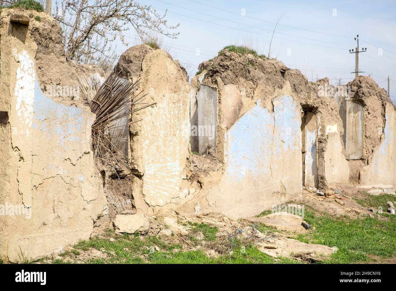 Ruined old house. Ruins of a house made of shell rock, straw and clay ...