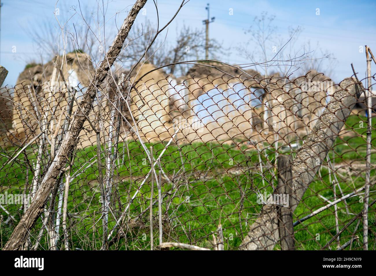 Ruined old house. Ruins of a house made of shell rock, straw and clay ...