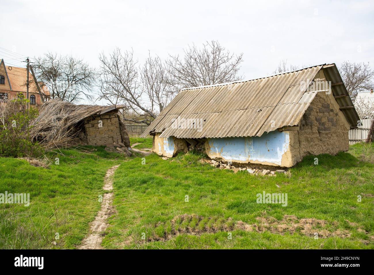 Ruined old house. Ruins of a house made of shell rock, straw and clay ...