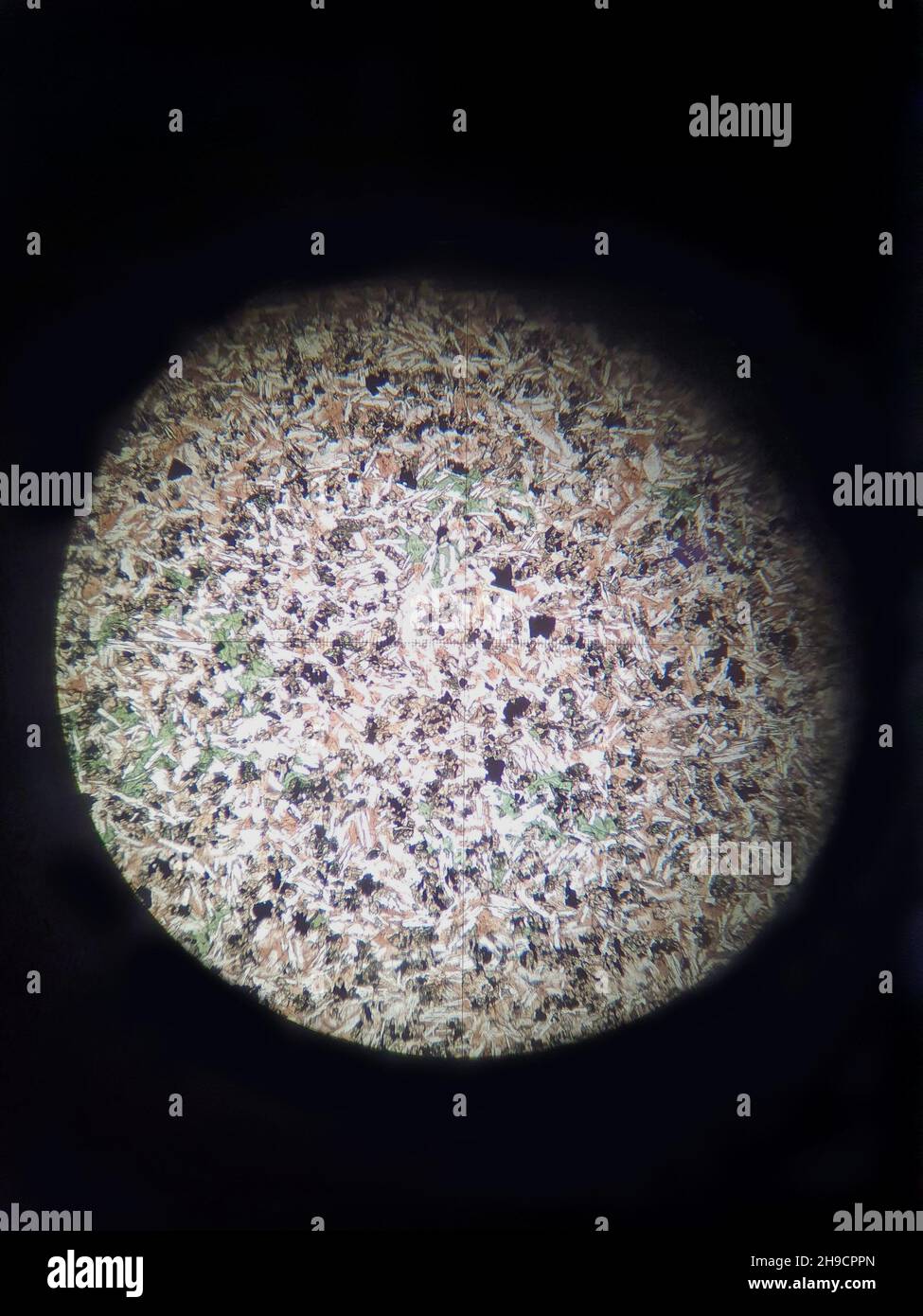 Colorful sphere, with vibrant colors. Crystal seen under the microscope ...