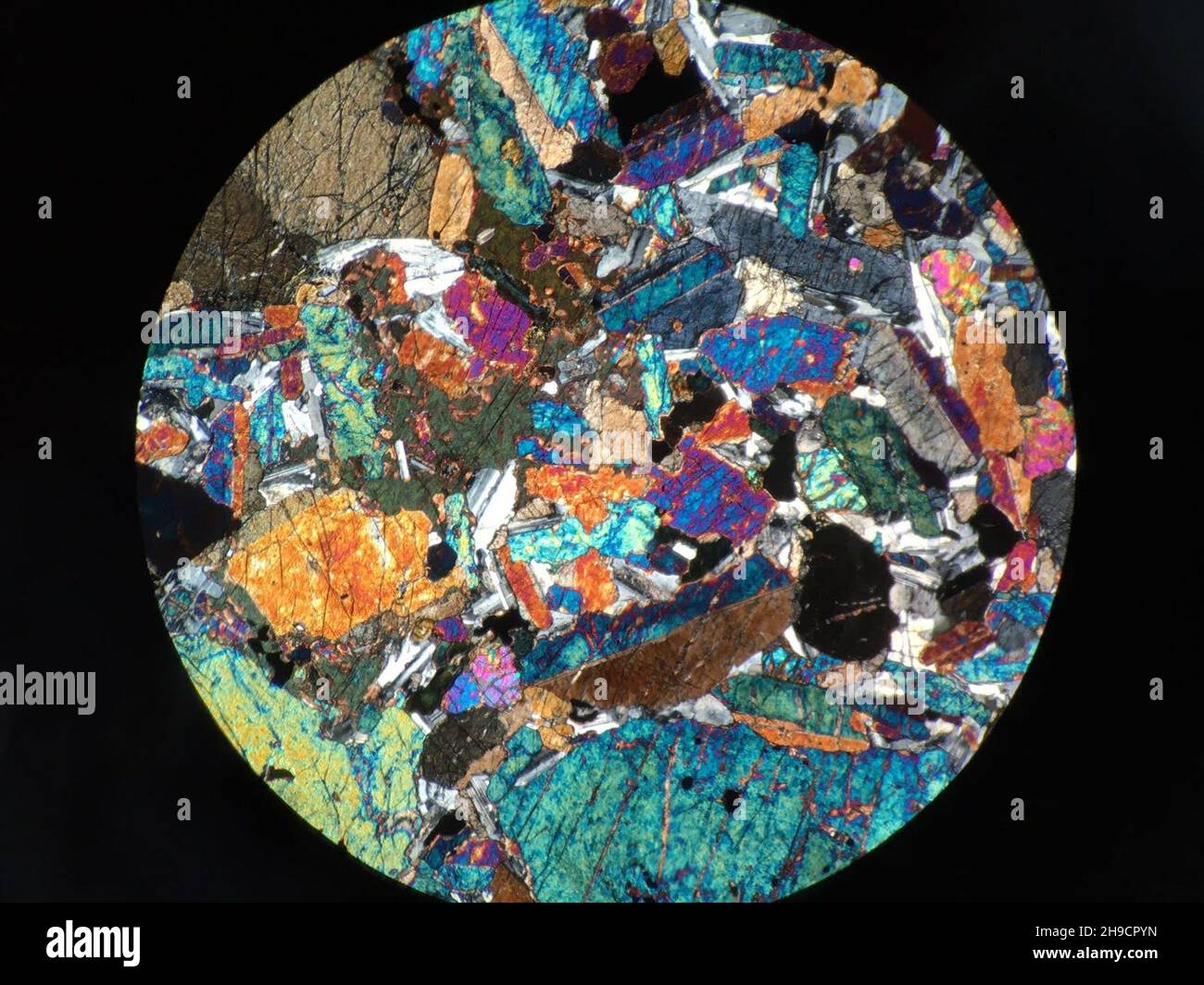 Colorful sphere, with vibrant colors. Crystal seen under the microscope ...