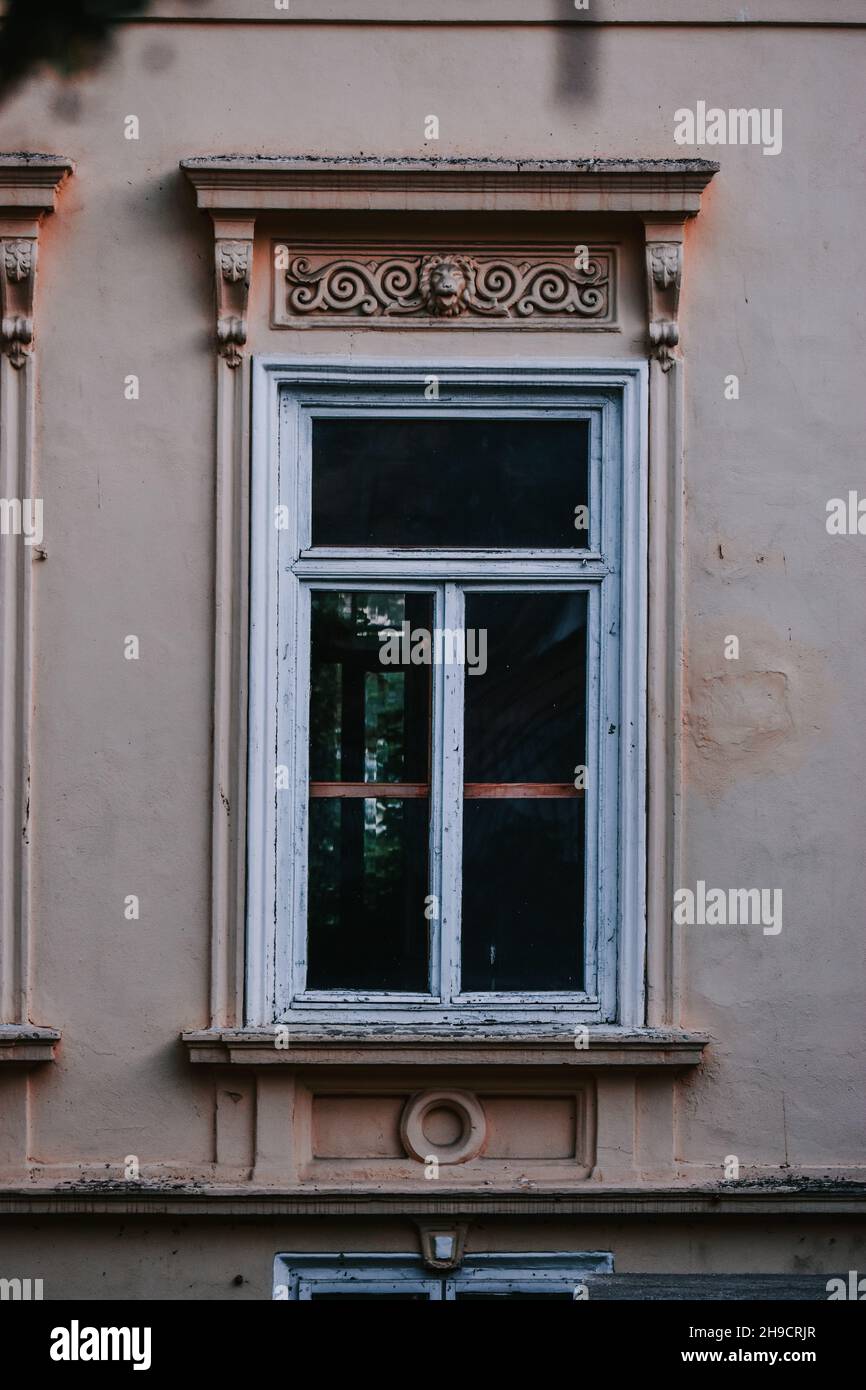 Vertical shot of a window of an old house building Stock Photo - Alamy