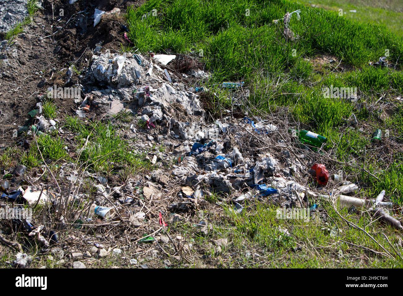 Littered with garbage fields and roadsides. Fireplaces from garbage and ...