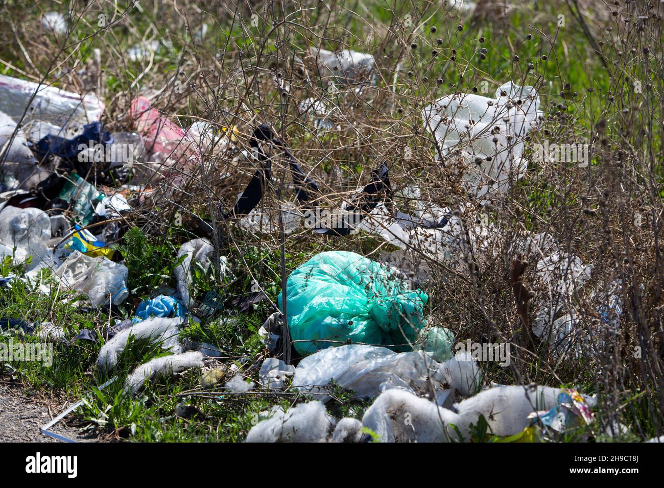 Littered with garbage fields and roadsides. Fireplaces from garbage and ...