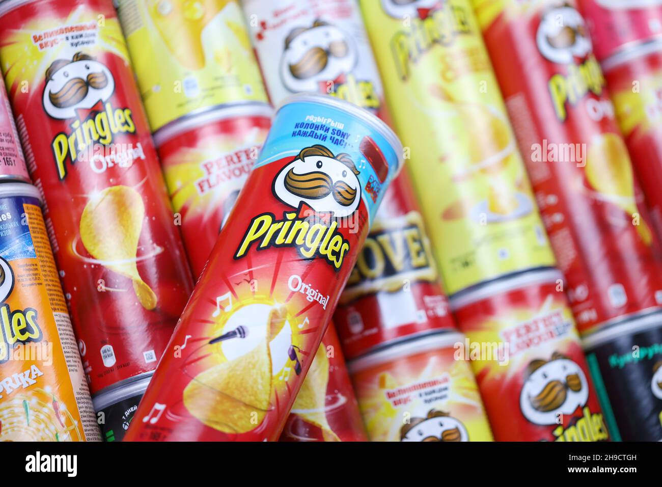 KHARKOV, UKRAINE - MARCH 30, 2021: Many Pringles cylinder chips boxes ...