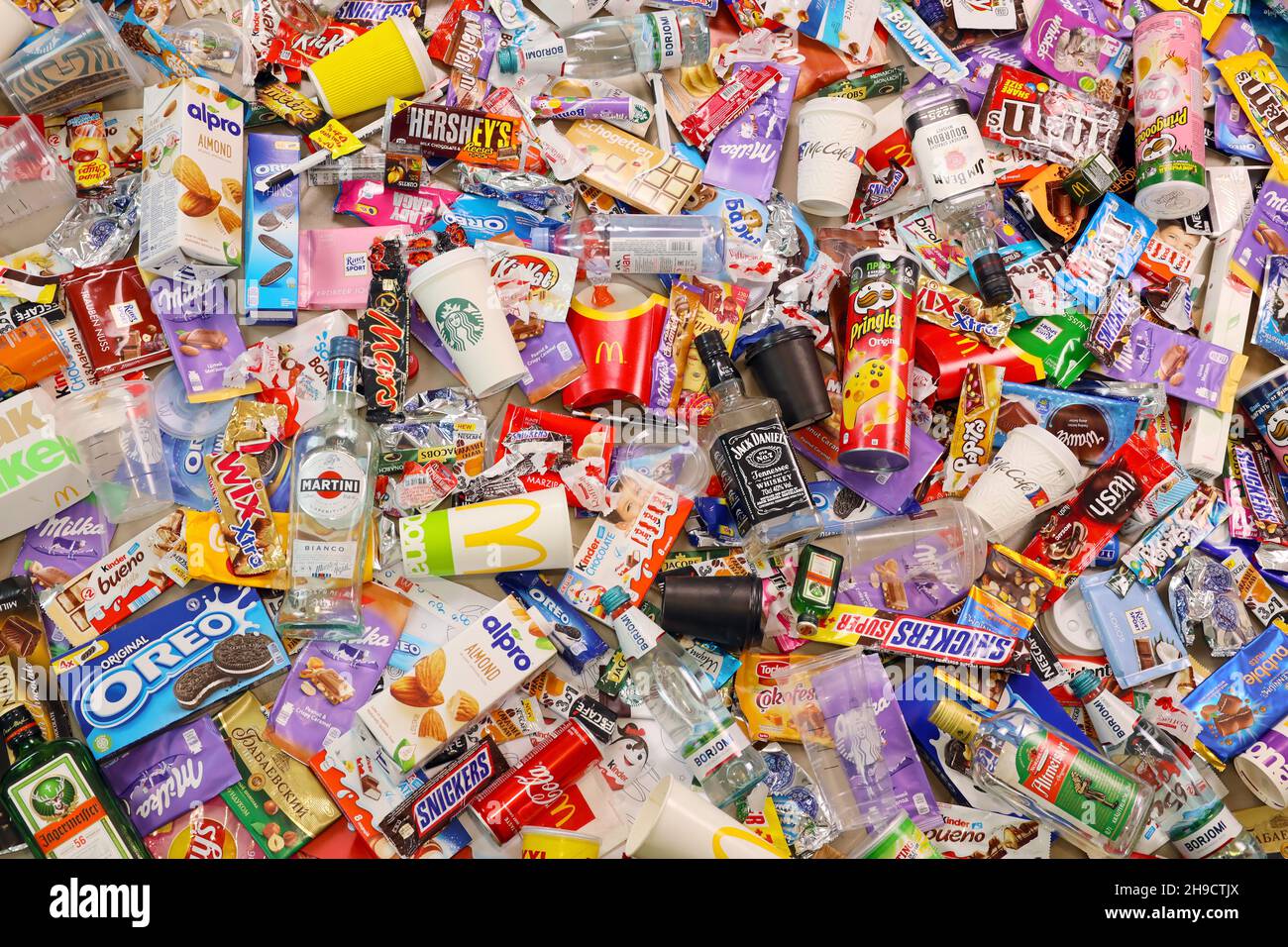 KHARKOV, UKRAINE - AUGUST 10, 2021: Big pile of various wrappings and ...