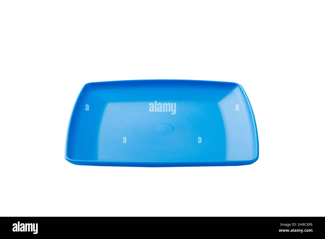 Blue plastic square plate isolated over white background. perspective ...