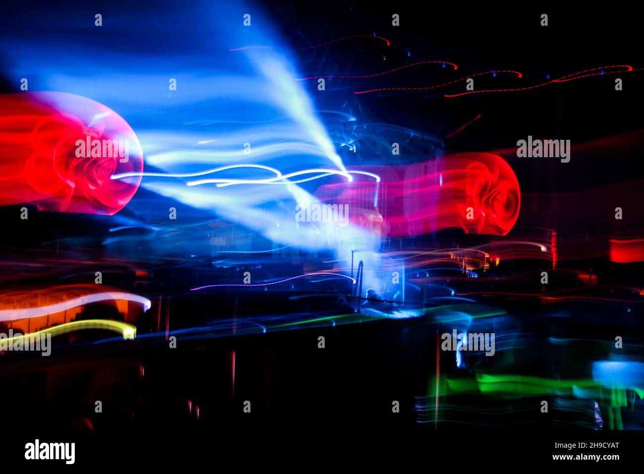 Blurry night club dj party people enjoy of music dancing sound with ...
