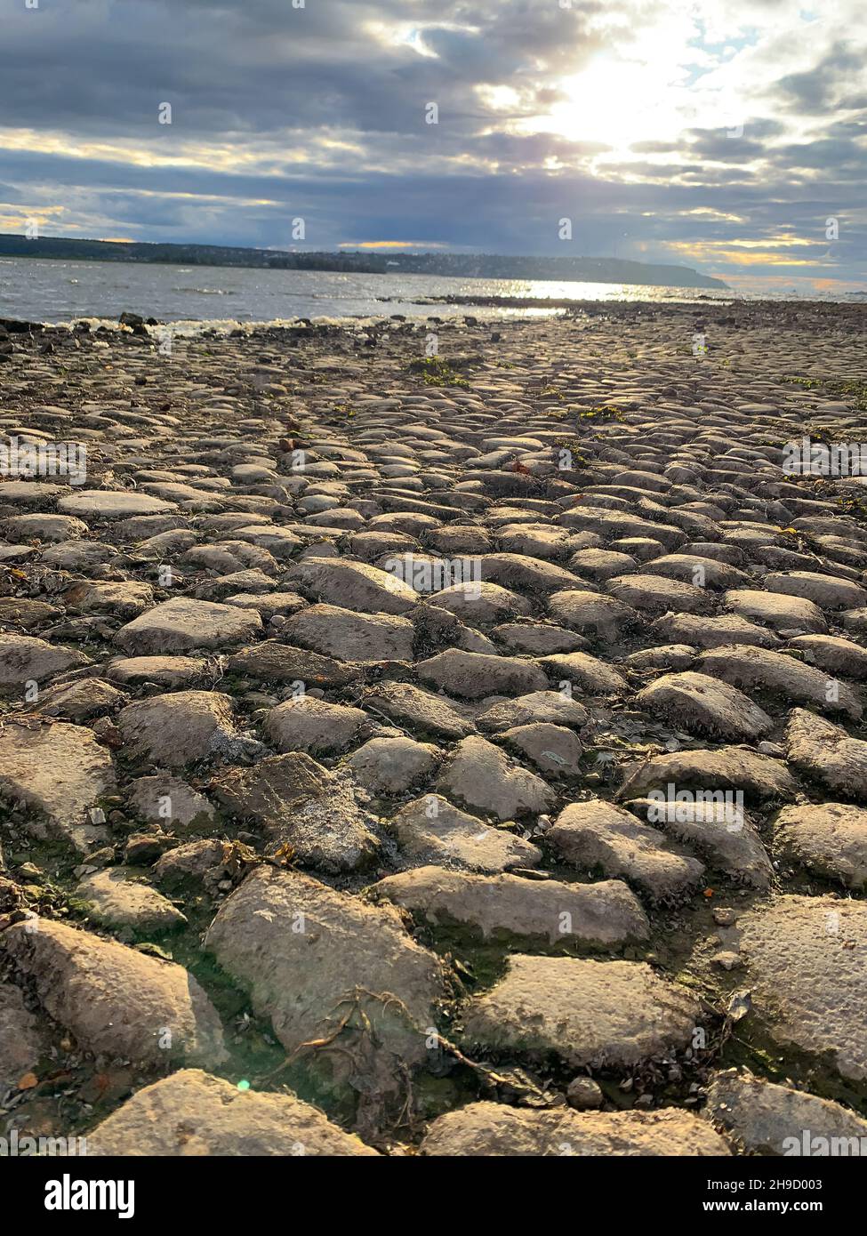 Old stone block road pavement Stock Photo - Alamy