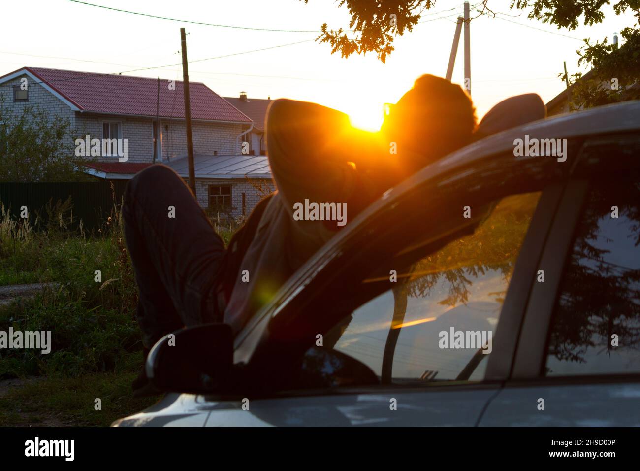 Couple watching sunset, car hi-res stock photography and images - Alamy