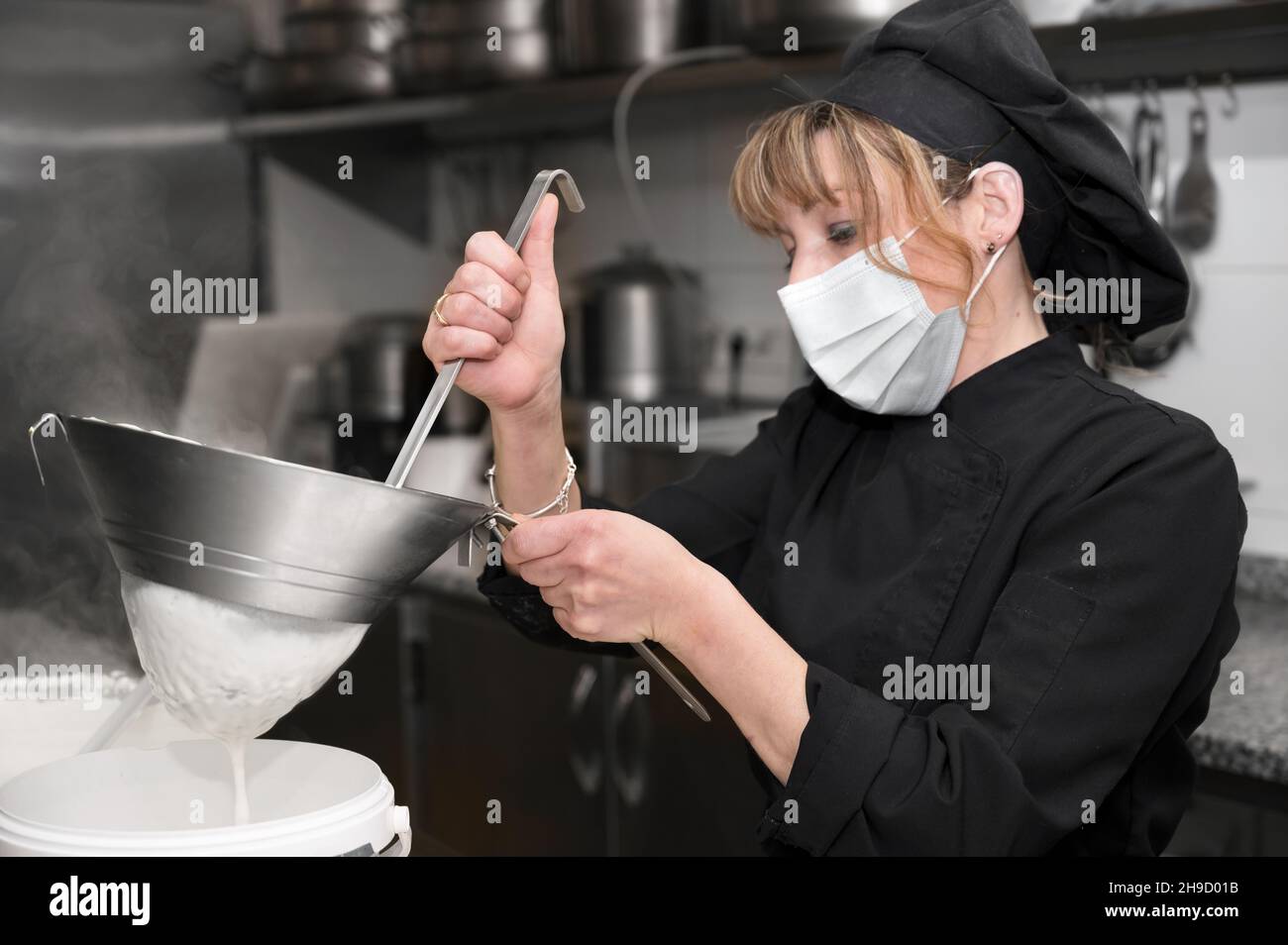 Woman cooking meal kitchen busy hi-res stock photography and images - Alamy