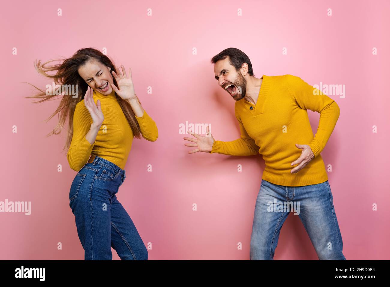 Cropped portrait of couple, emotive man screaming at woman isolated ...