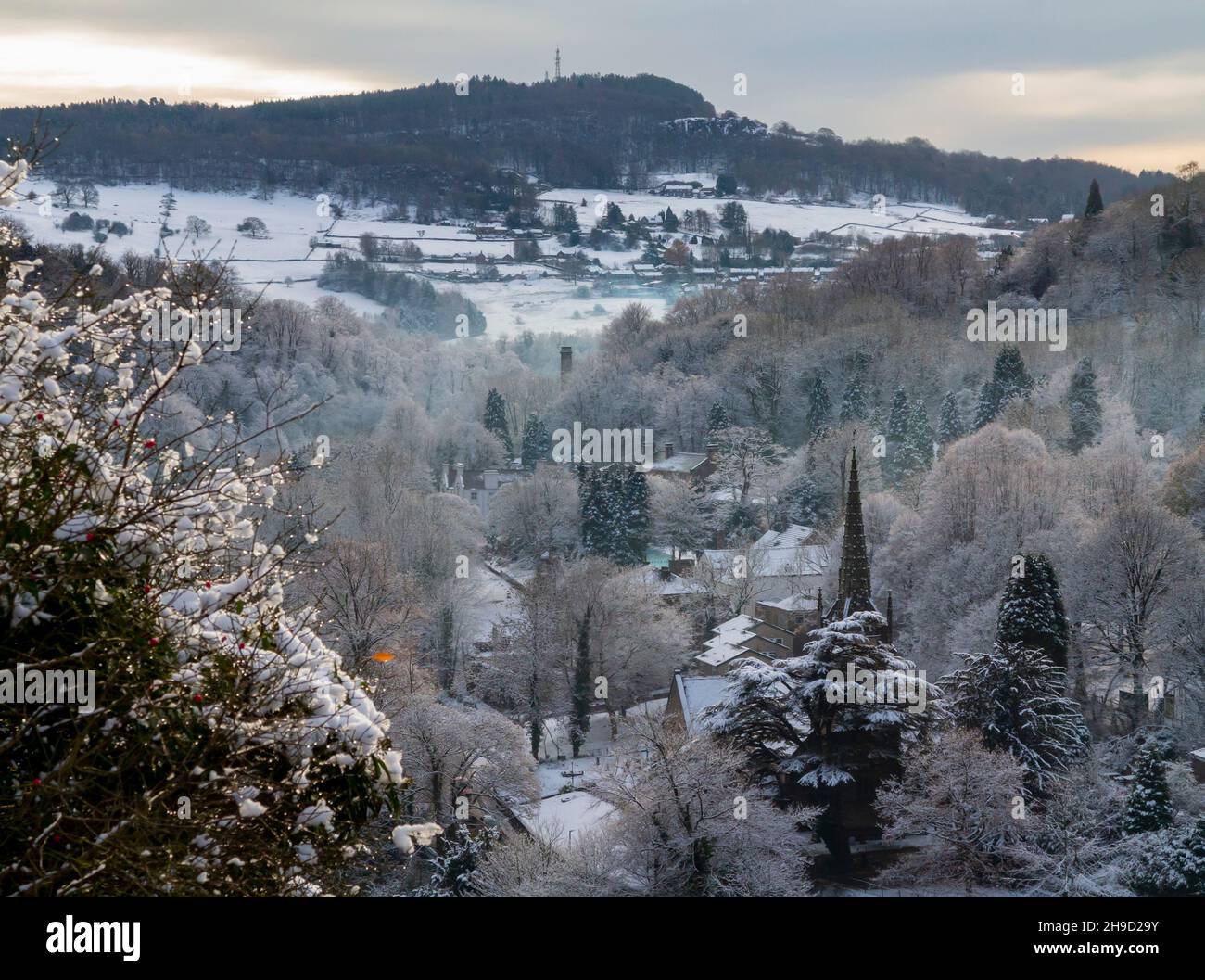 Snow covered landscape with trees at Matlock Bath in the Derbyshire ...