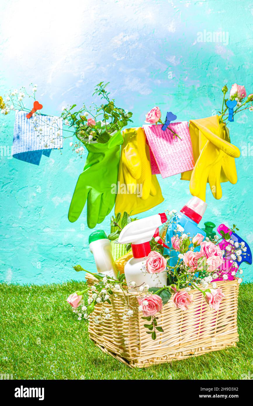 Creative bright spring cleaning concept. Tools, bottles, accessories ...