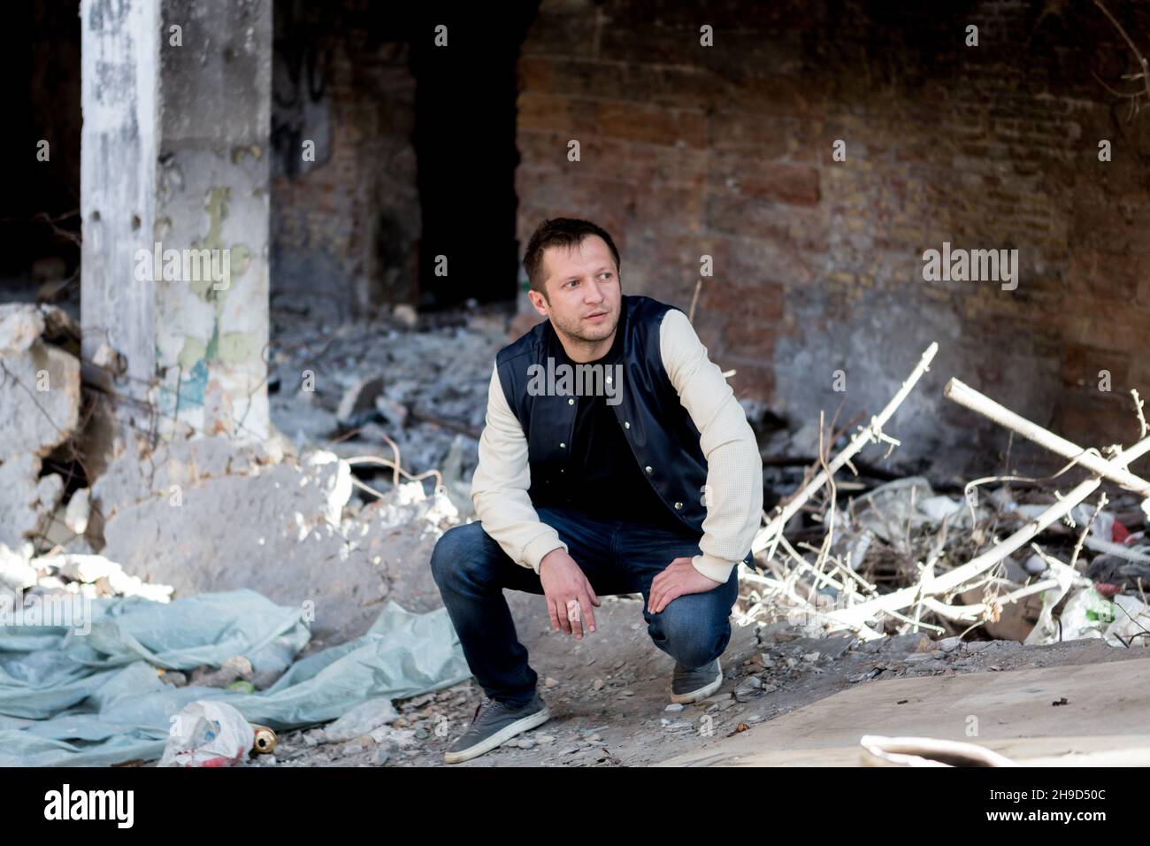 Destroyed building man hi-res stock photography and images - Alamy