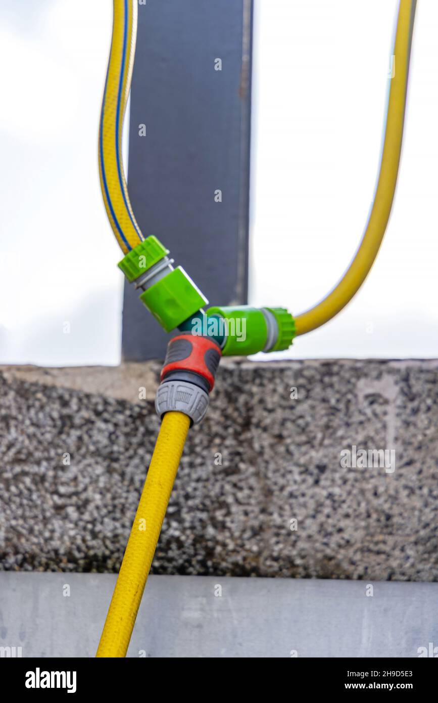 Water Hose Three Way Connector Plastic Splitter Stock Photo - Alamy