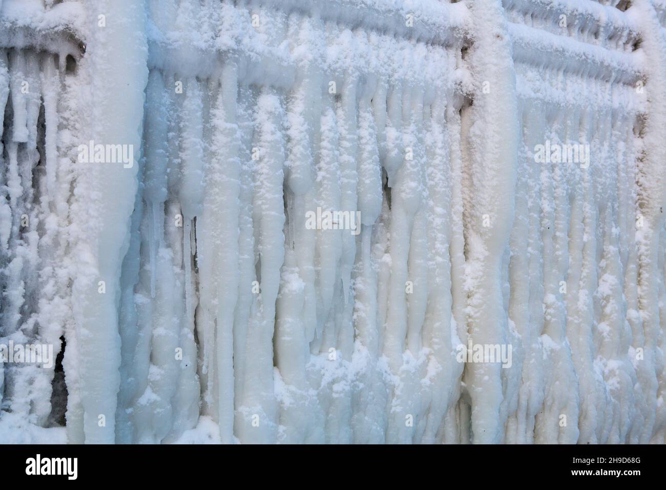 Icing. Winter natural disaster icing sea promenade after winter storm ...