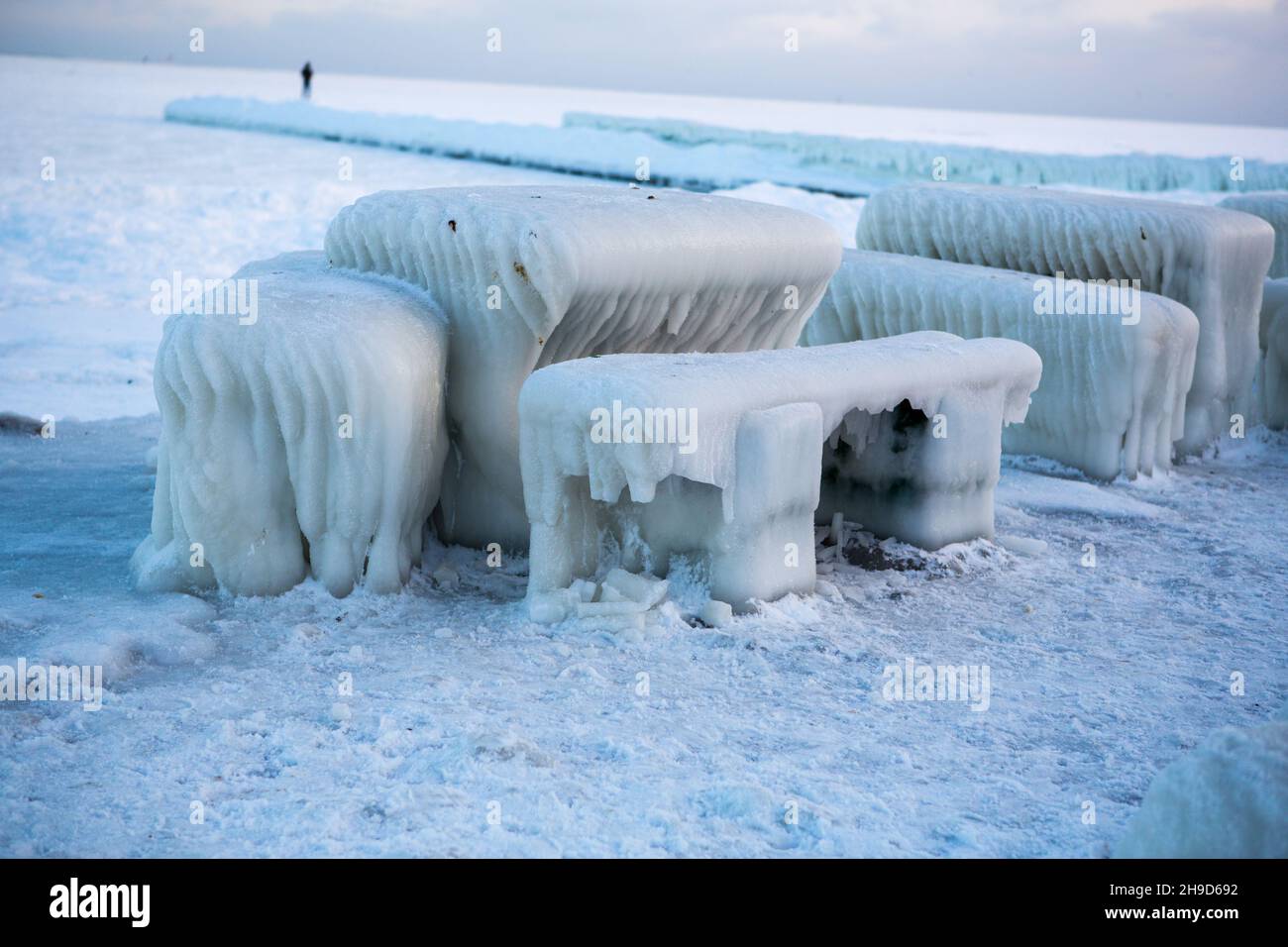 Icing. Winter natural disaster icing sea promenade after winter storm ...