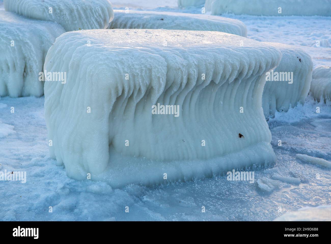Icing. Winter natural disaster icing sea promenade after winter storm ...