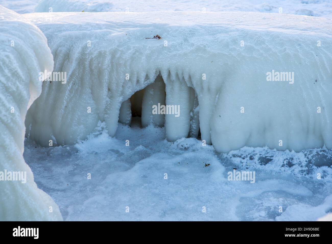 Icing. Winter natural disaster icing sea promenade after winter storm ...