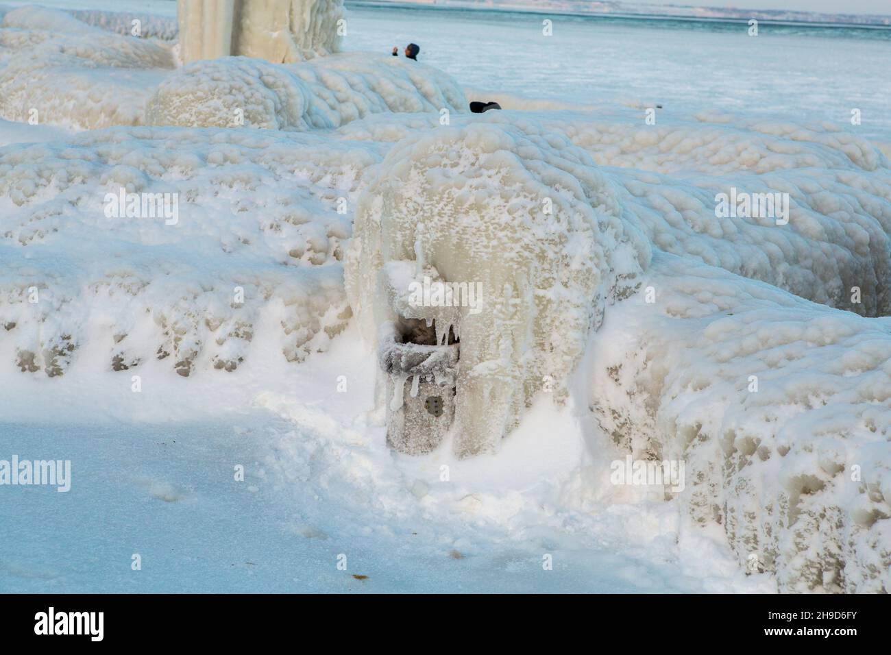 Icing. Winter natural disaster icing sea promenade after winter storm ...