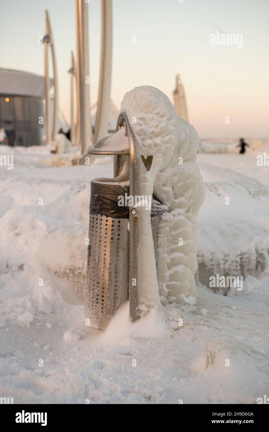 Icing. Winter natural disaster icing sea promenade after winter storm ...