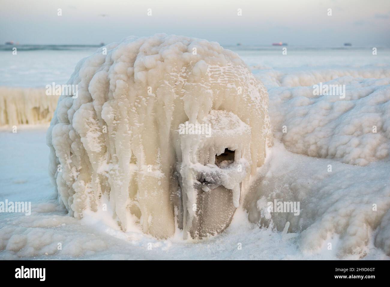 Icing. Winter natural disaster icing sea promenade after winter storm ...