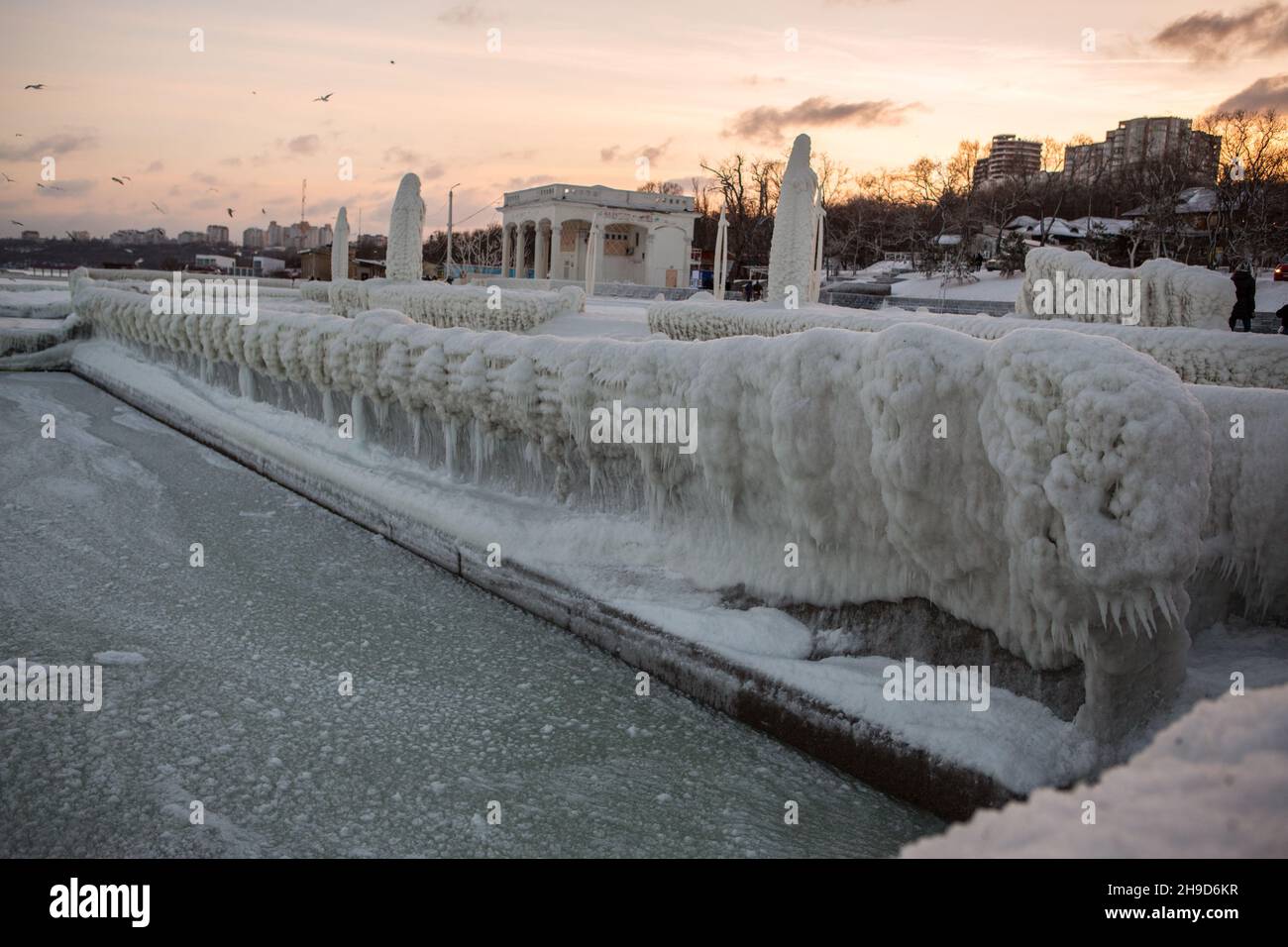 Icing. Winter natural disaster icing sea promenade after winter storm ...