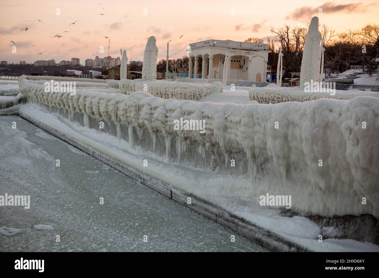 Icing. Winter natural disaster icing sea promenade after winter storm ...