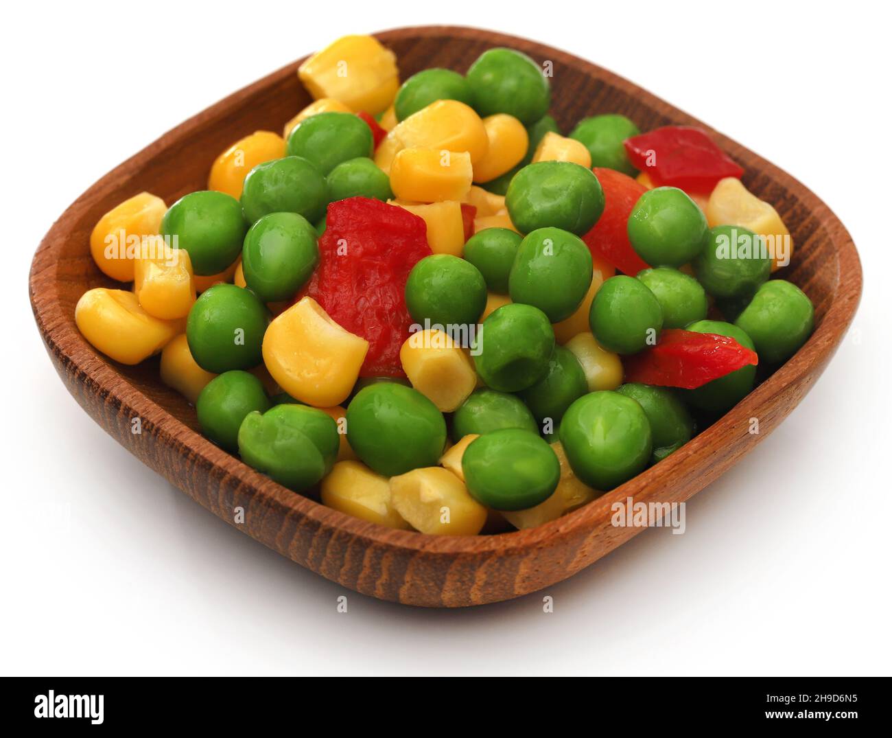 Mixed vegetables in a wooden bowl over white background Stock Photo - Alamy