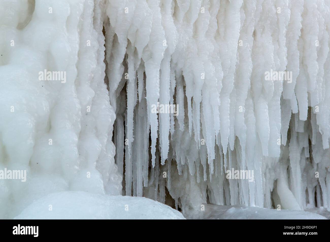 Icing. Winter natural disaster icing sea promenade after winter storm ...