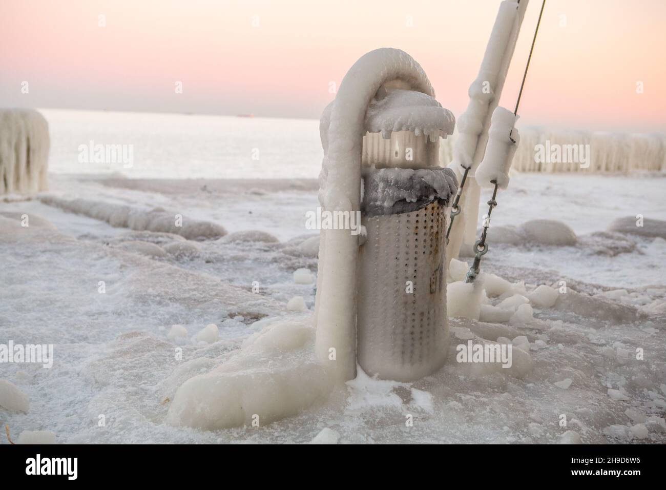 Icing. Winter natural disaster icing sea promenade after winter storm ...