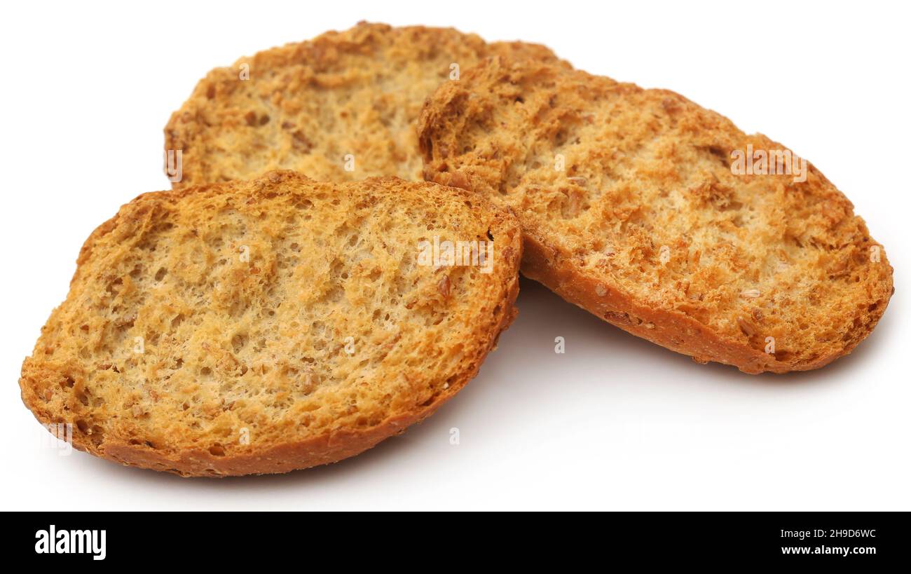 Toast biscuits over white background Stock Photo - Alamy