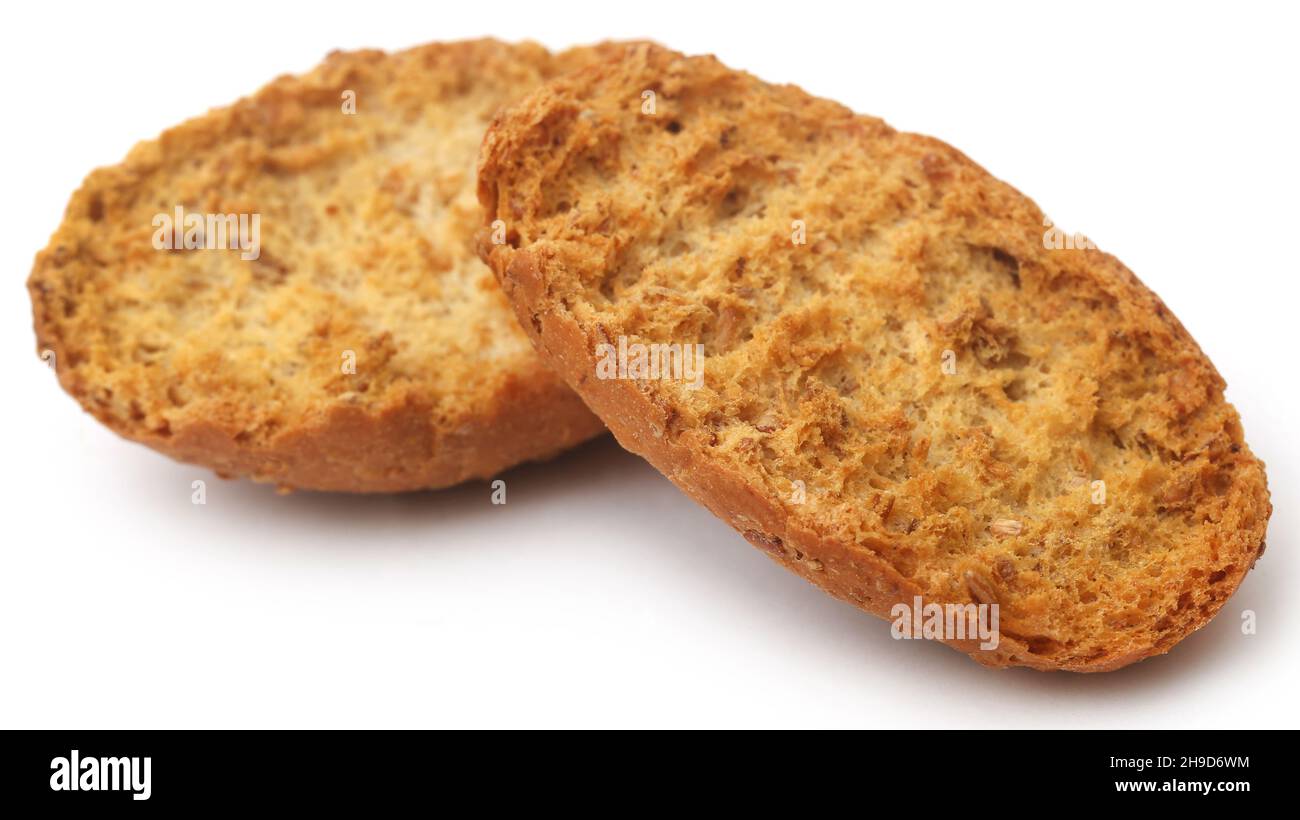 Toast biscuits over white background Stock Photo - Alamy