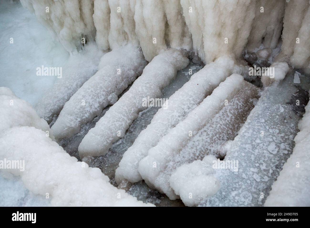 Icing. Winter natural disaster icing sea promenade after winter storm ...