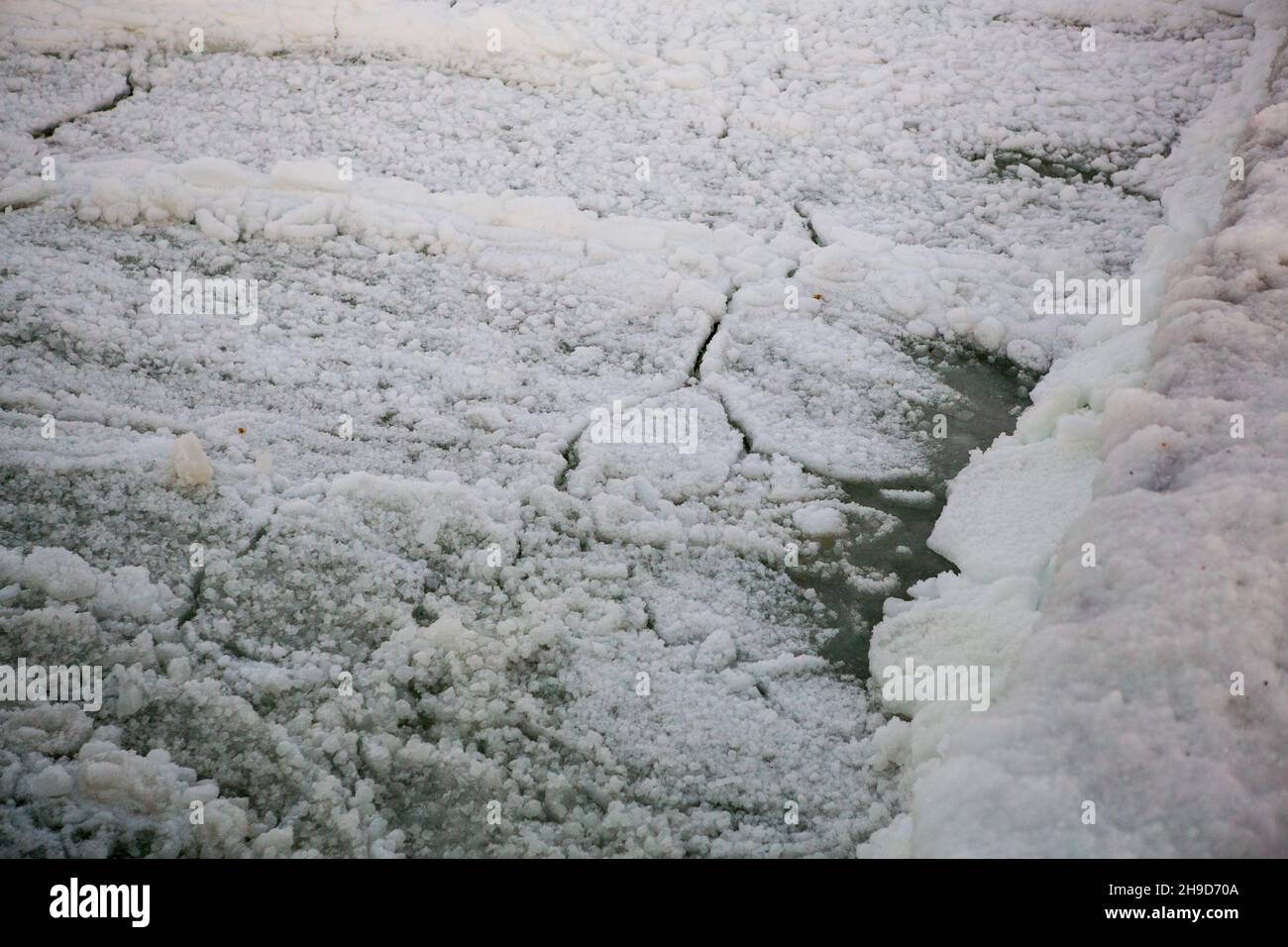 Icing. Winter natural disaster icing sea promenade after winter storm ...