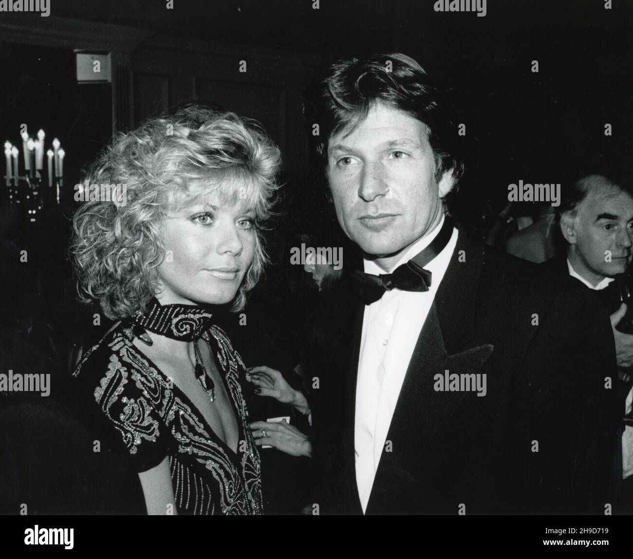 London, UK. LIBRARY. Glynis Barber and Michael Brandon at a party. Late ...