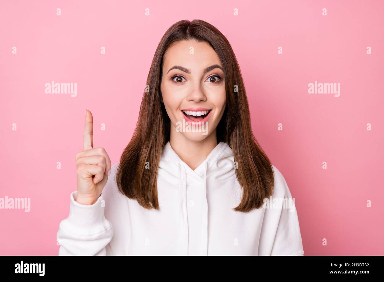Photo of happy positive young woman point finger up idea plan good mood ...