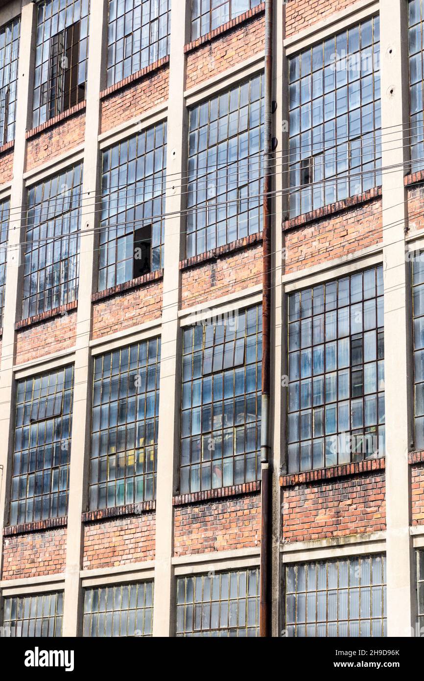 Wall of an old abandoned factory Stock Photo - Alamy