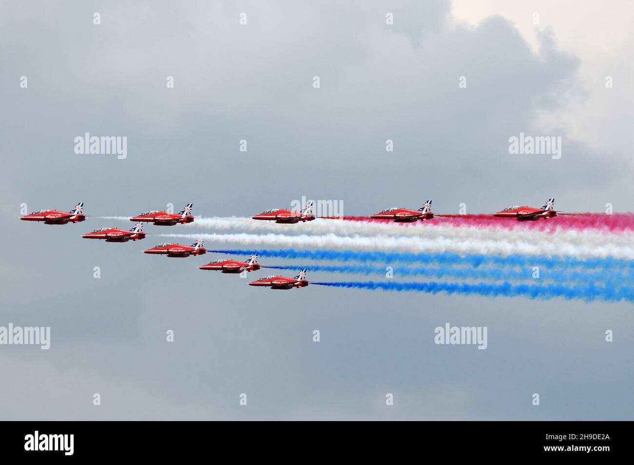 The "Red Arrows" consisting of 9 "Hawk" trainer aircraft Stock Photo ...