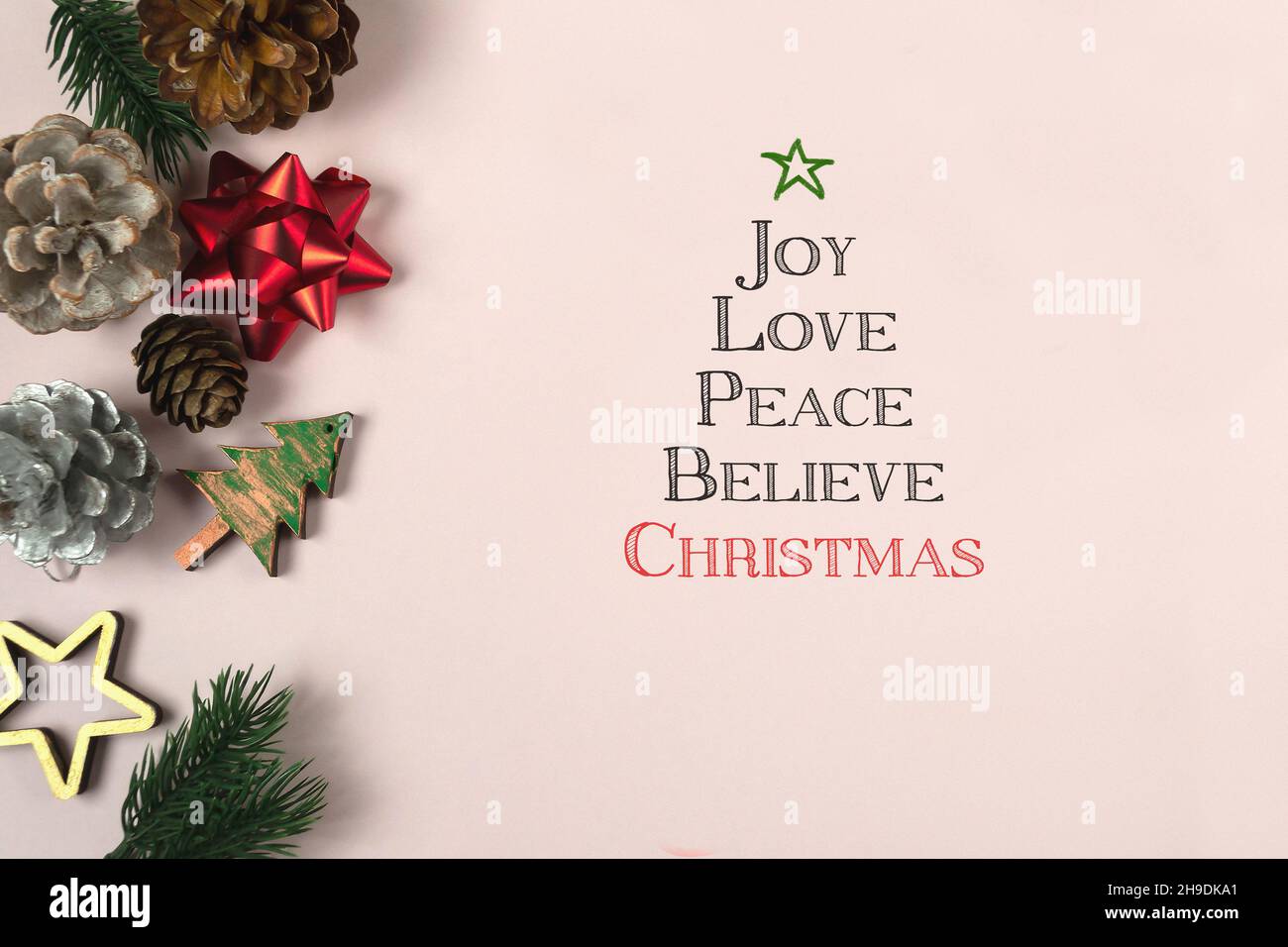 Christmas wishes in the form of a tree: joy,love,peace,believe ...