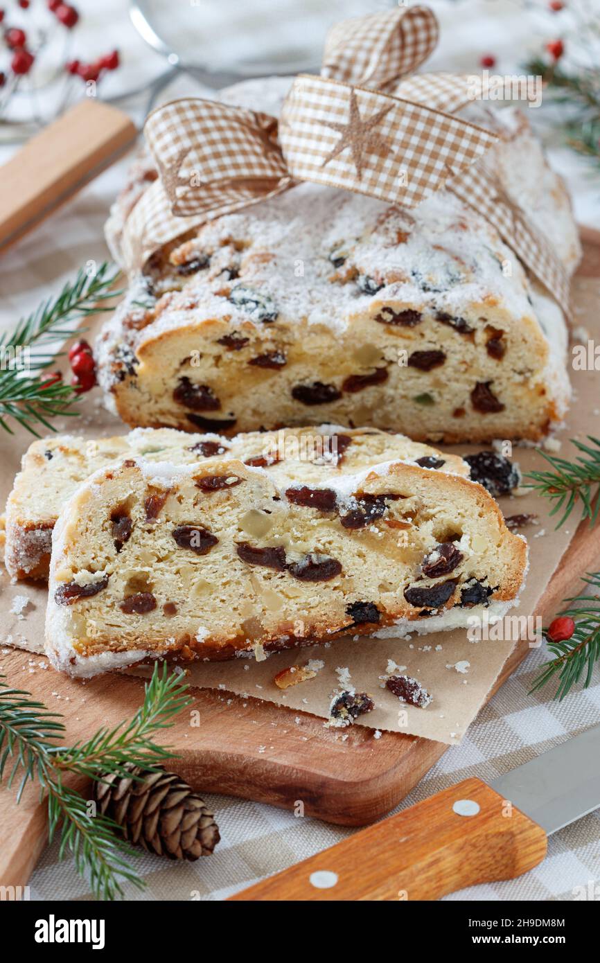 christmas bakery fruit cake stollen on wooden board Stock Photo - Alamy
