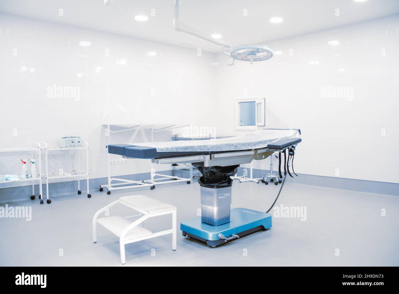Empty operating room in a hospital. Surgical equipment with operating ...