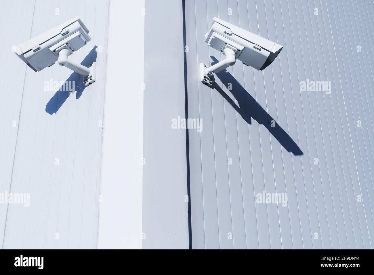 CCTV camera on the wall of the building for monitoring and protection ...