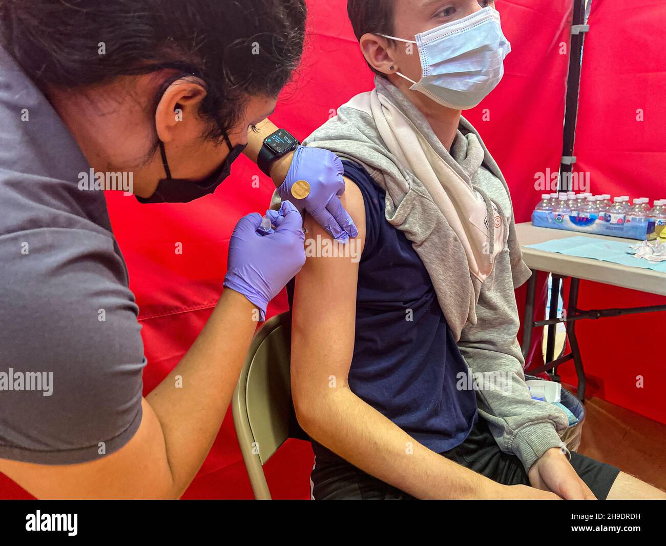 15 year old boy (Model Released) receives the Pfizer Covid vaccine in ...