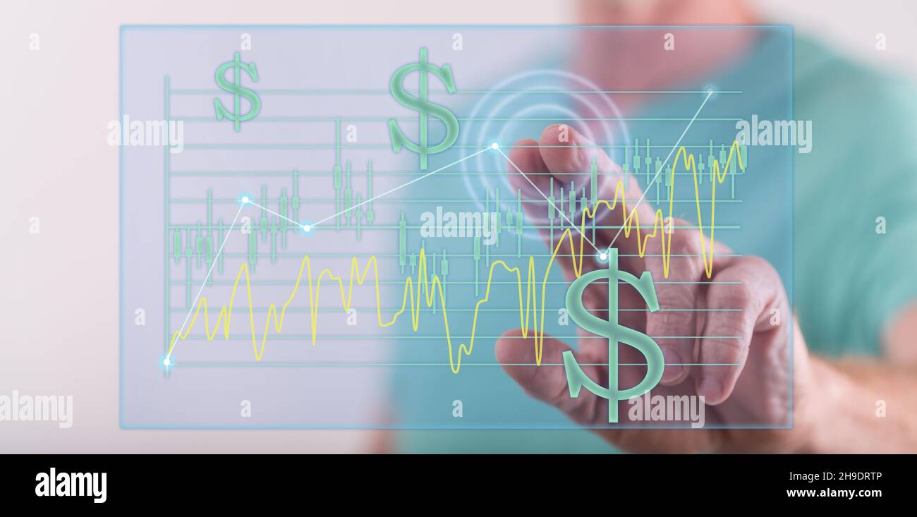 Man touching a stock exchange concept on a touch screen with his finger ...