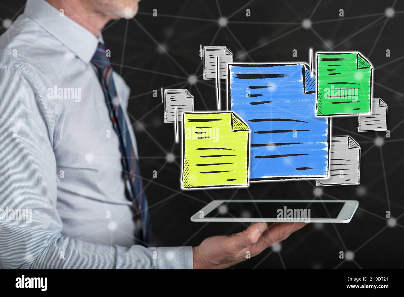 Document concept above a tablet held by a man Stock Photo - Alamy